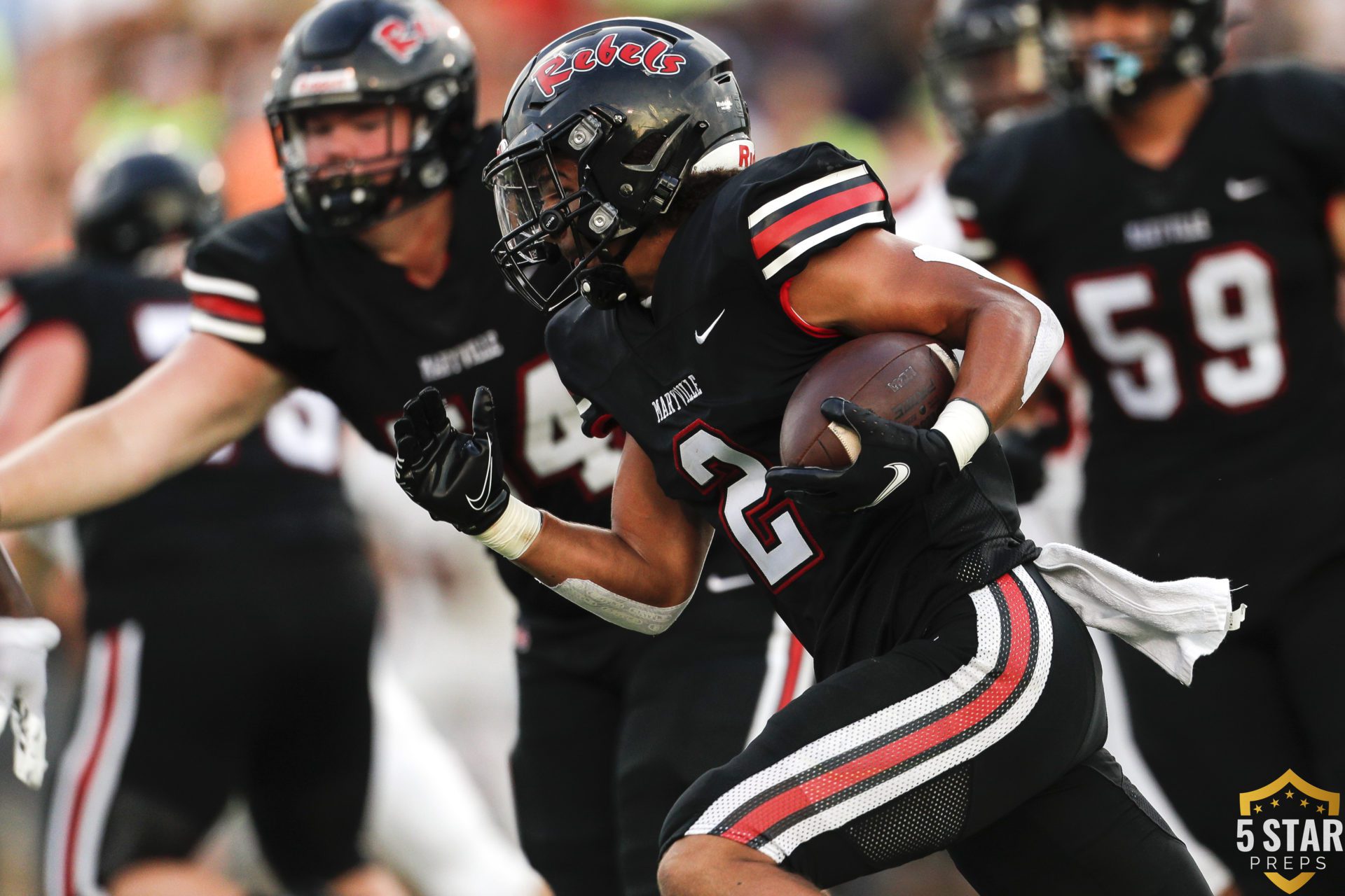 Noah Vaughn hits running back milestone and Maryville coasts past West ...